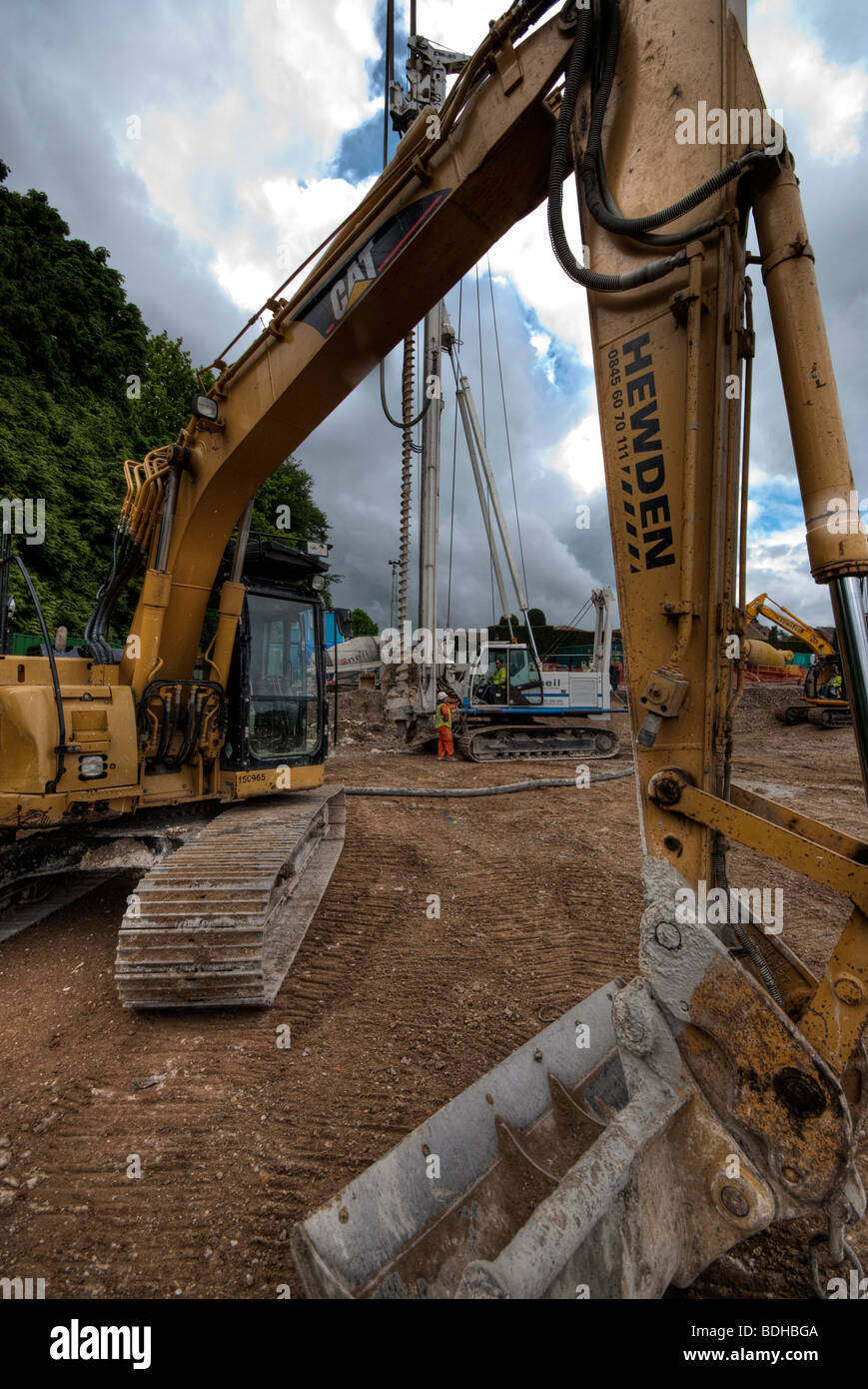 Earth moving equipment on construction site Stock Photo - Alamy