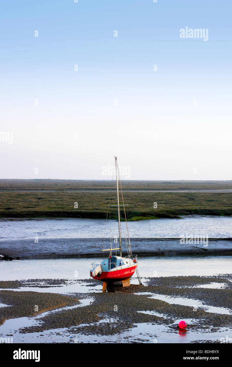 Red Boat and Buoy on marshes Stock Photo - Alamy