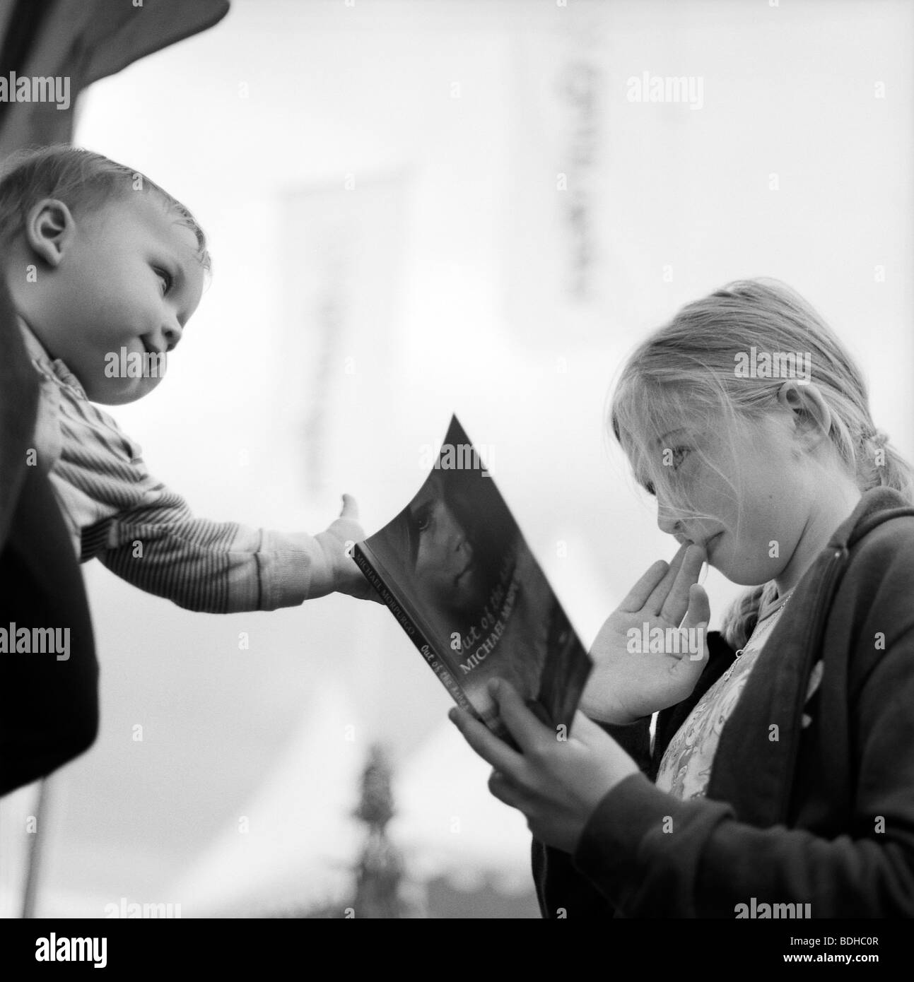 Kids in queue Black and White Stock Photos & Images - Alamy