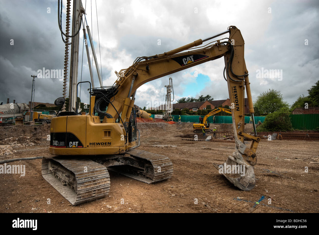 Earth moving equipment on construction site Stock Photo - Alamy