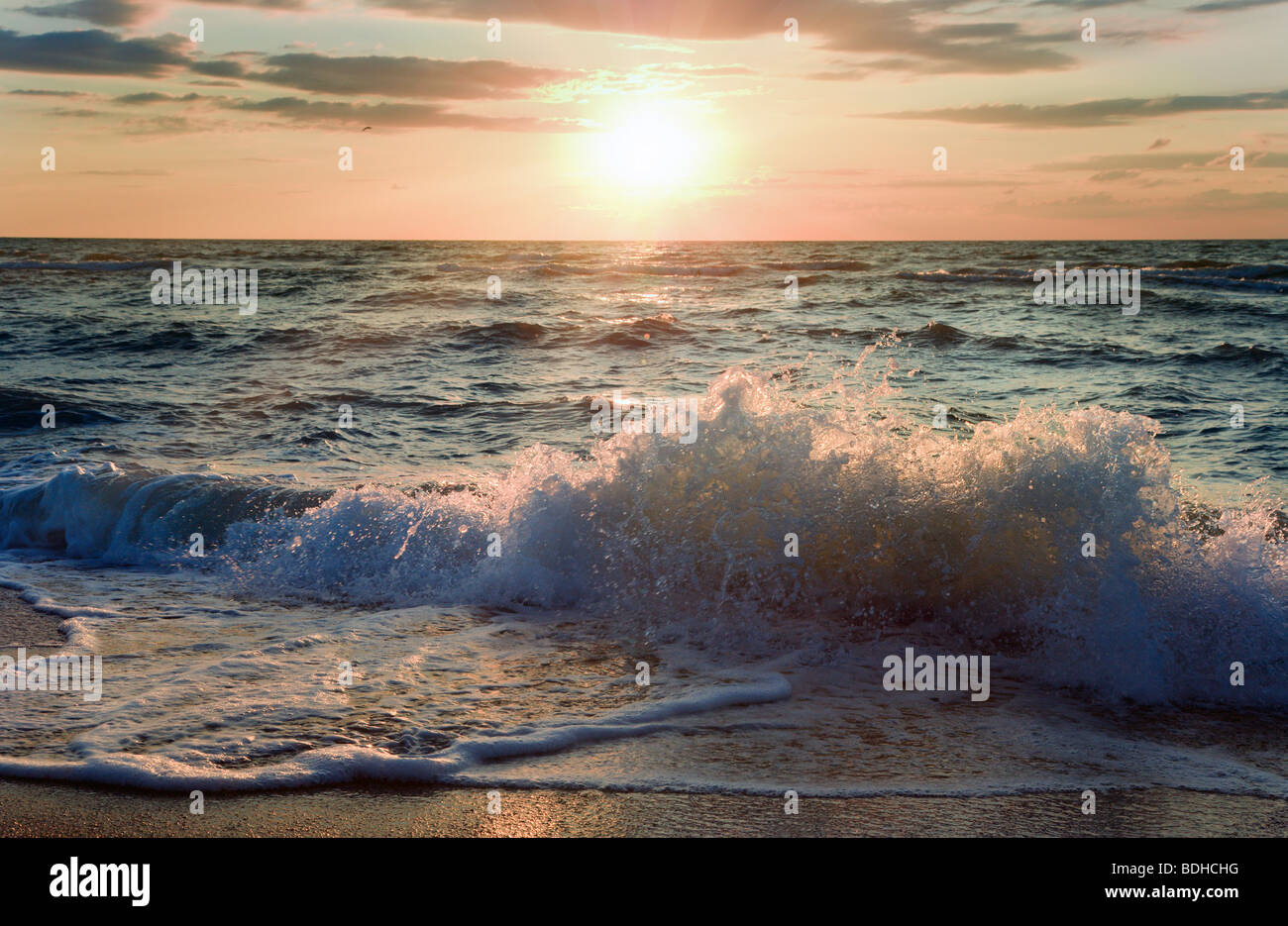Sea sunset surf great wave break on coastline Stock Photo - Alamy