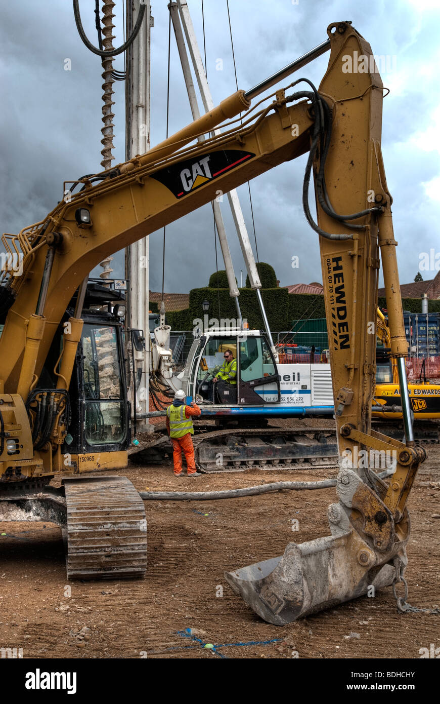 Earth moving equipment on construction site Stock Photo - Alamy