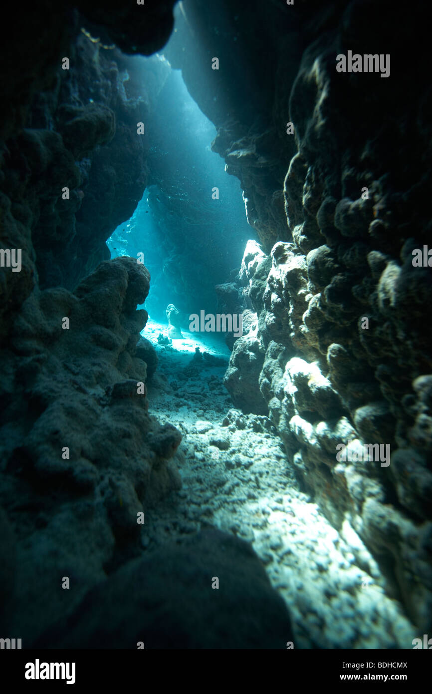 Light coming down through an underwater cave Stock Photo - Alamy