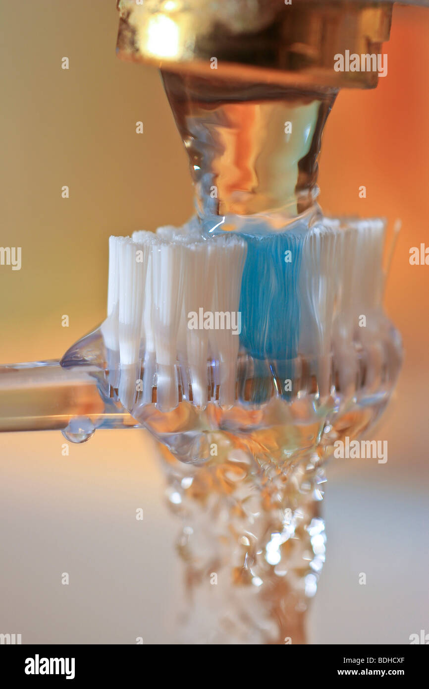 Water drops falling from tap Stock Photo - Alamy