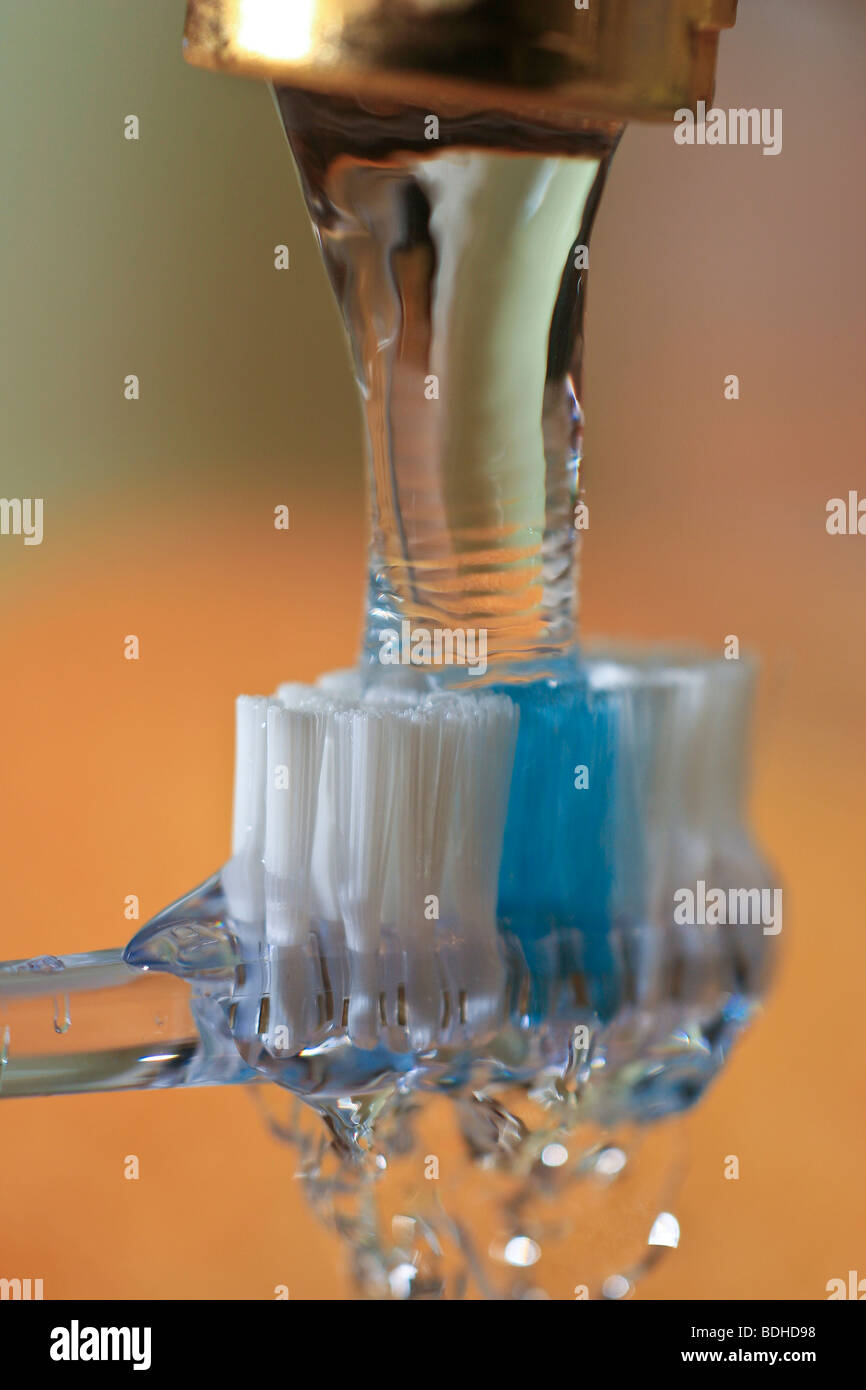 Water drops falling from tap Stock Photo - Alamy