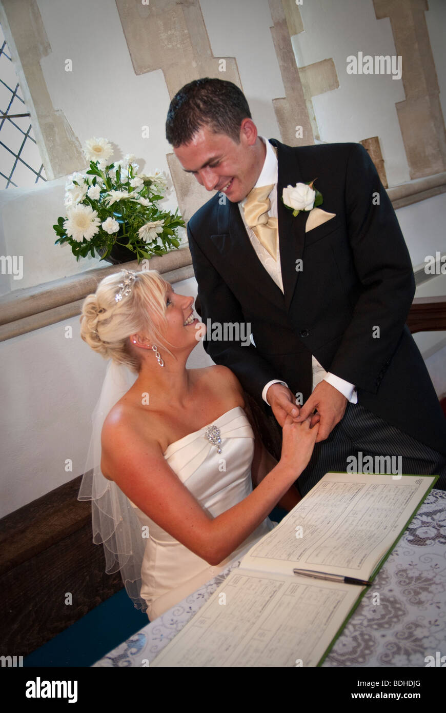 Signing register church hi-res stock photography and images - Alamy