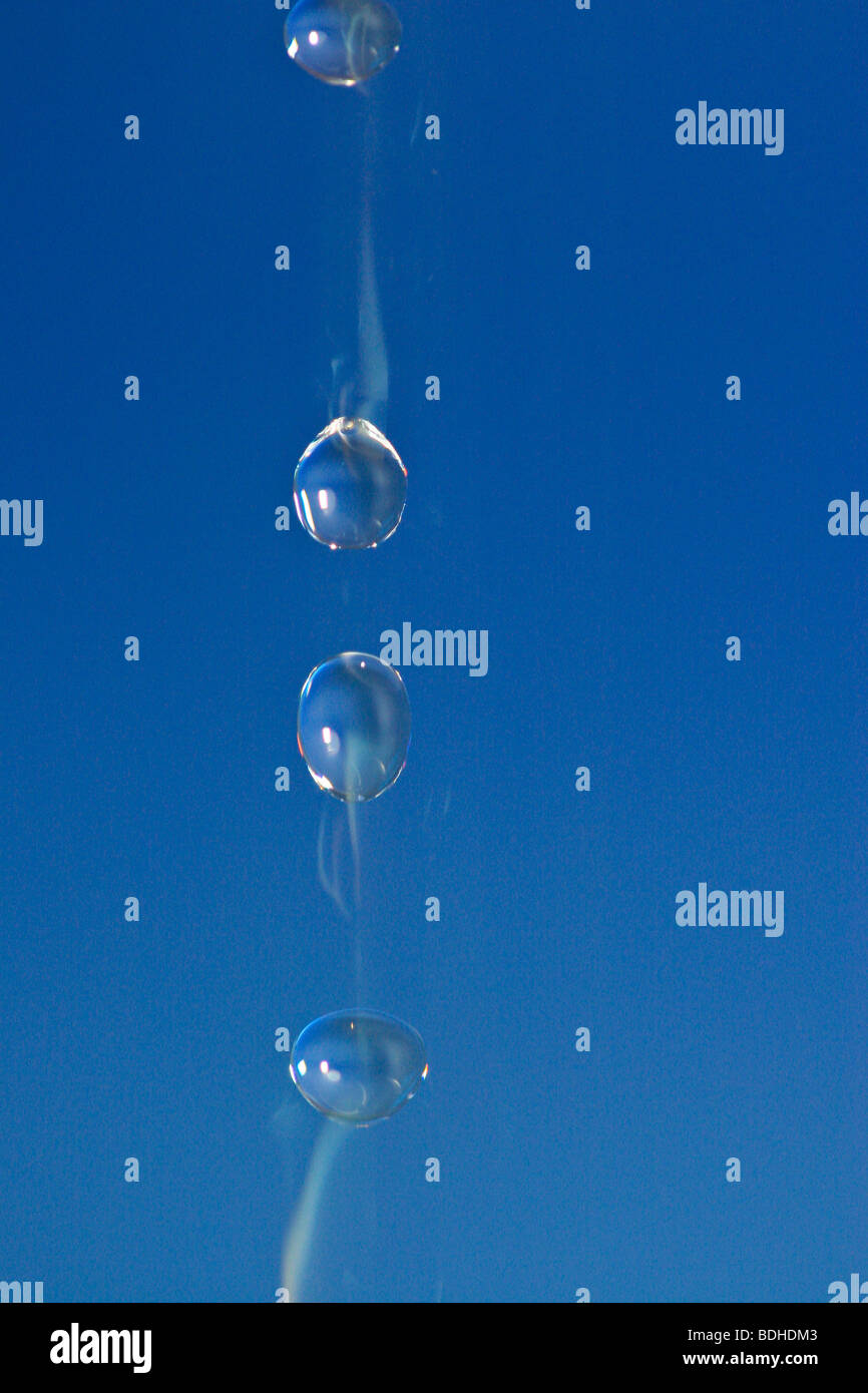 Water drops falling from tap Stock Photo - Alamy