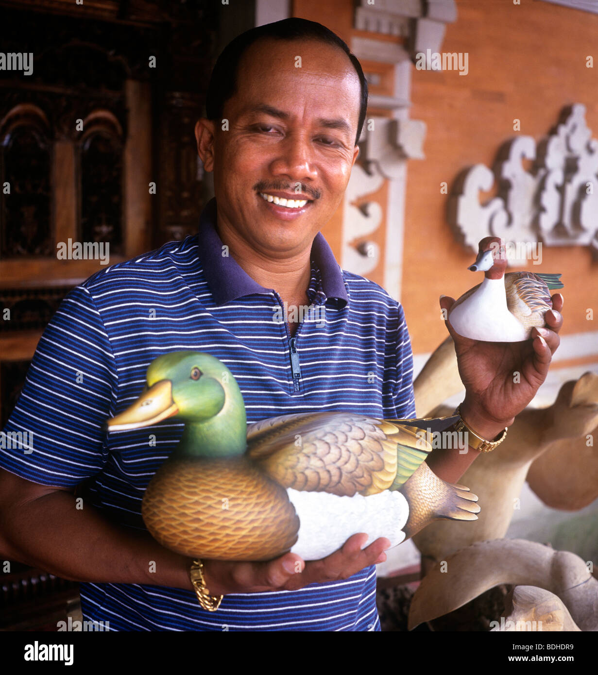 Indonesia, Bali, Crafts, Ngurah Umum the Duck man of Bali hoding two ...
