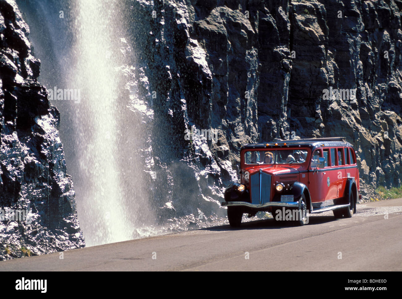 An historic red bus, Glacier National Park, MT Stock Photo - Alamy