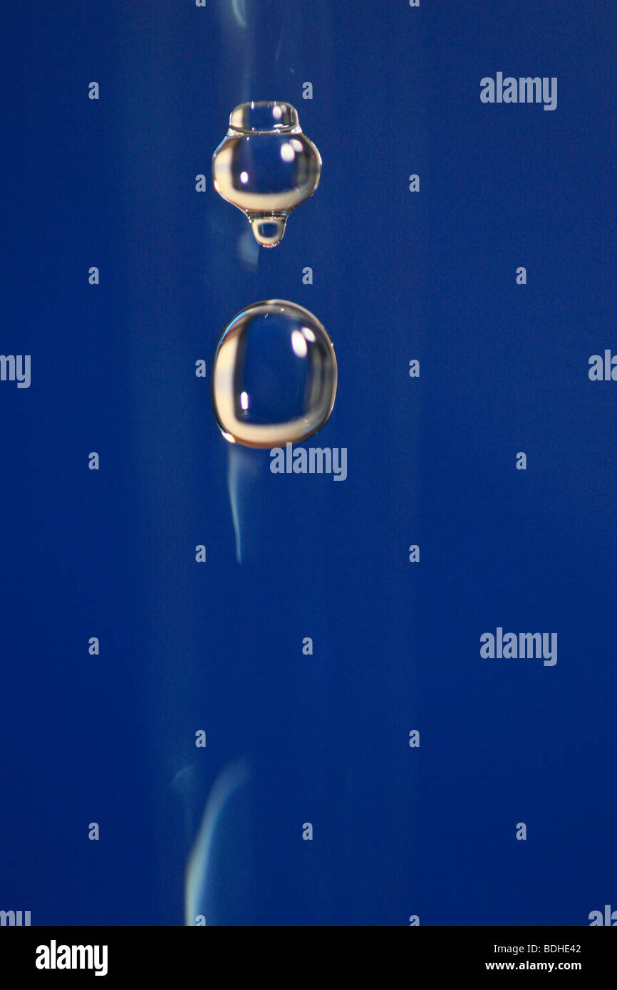 Water drops falling from tap Stock Photo - Alamy