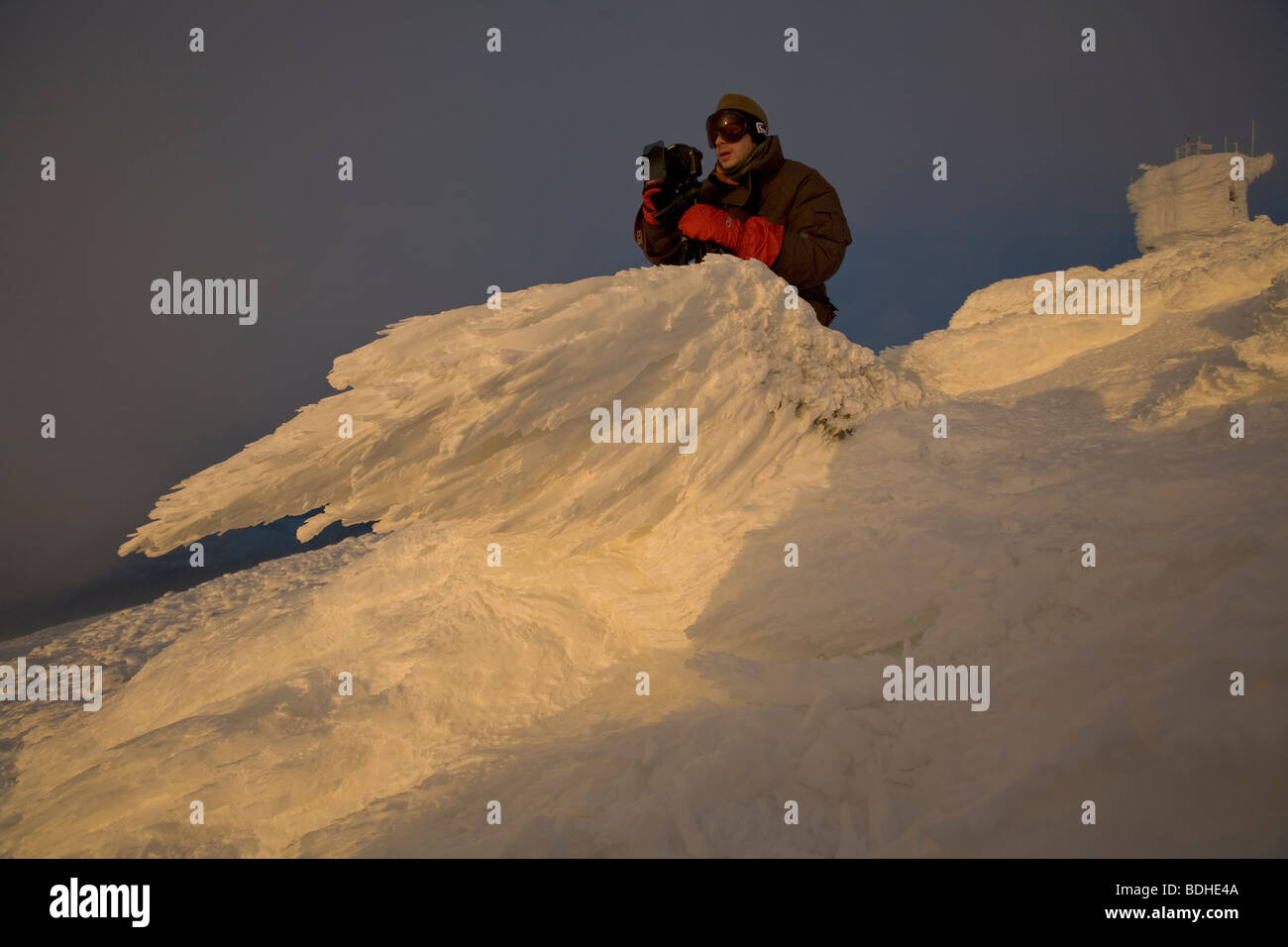 A weather observer and photographer, takes photos of a sunset from the ...