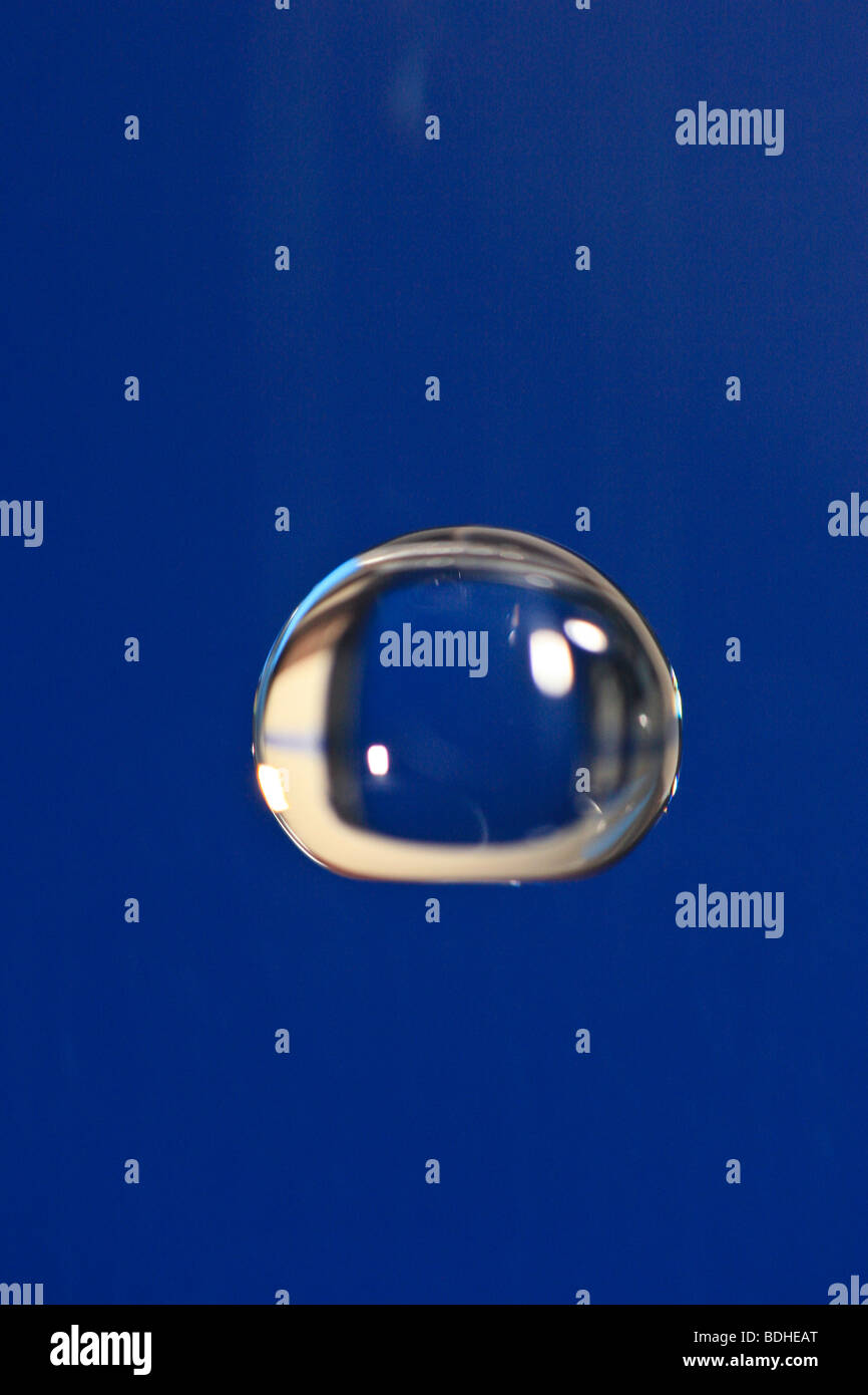 Water drops falling from tap Stock Photo - Alamy