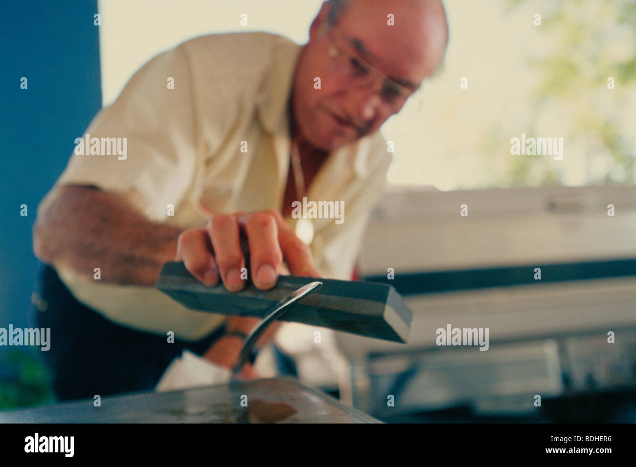 Sword sharpening hi-res stock photography and images - Alamy