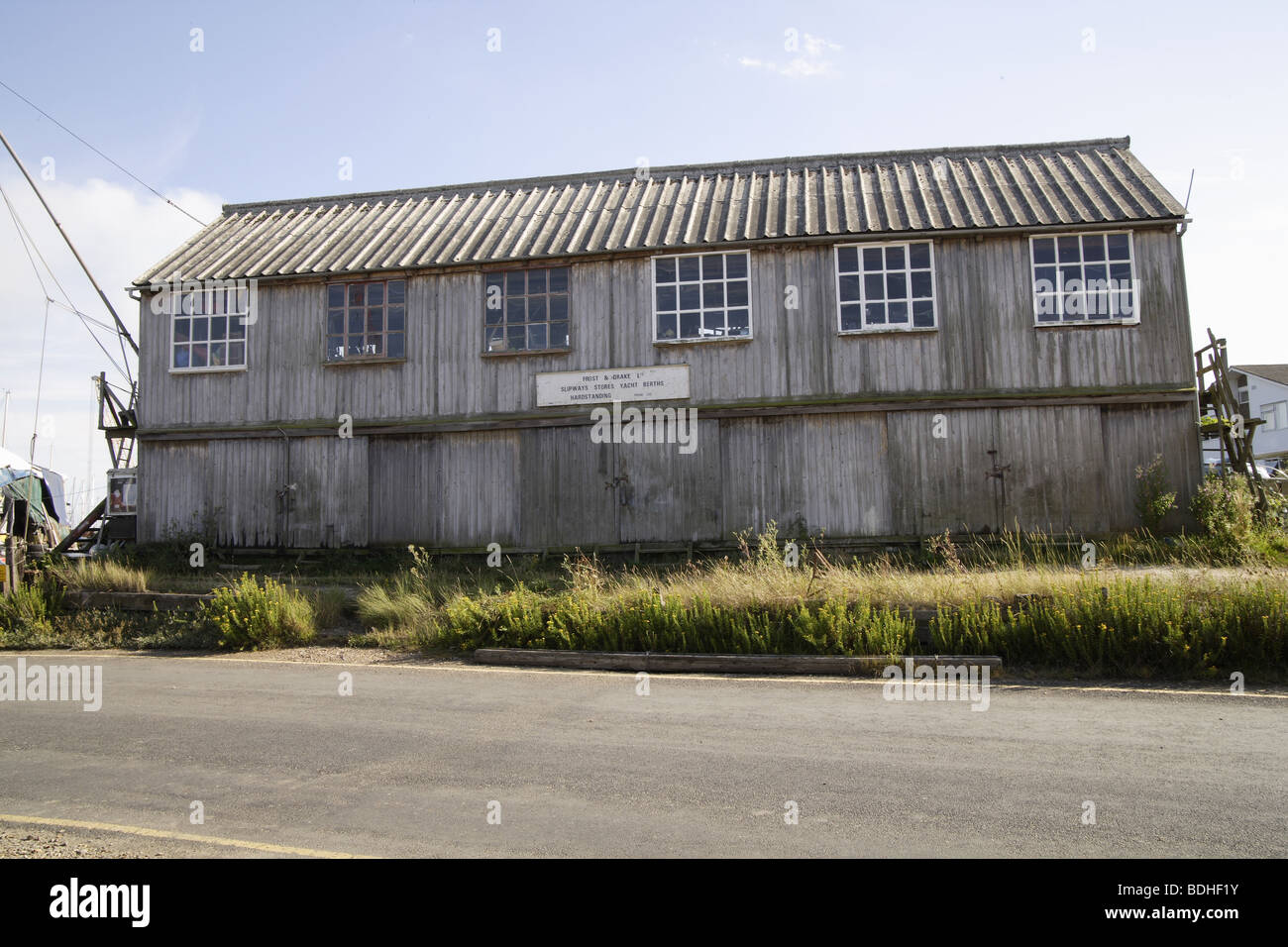 Boat shed old corrugated roof waterside Stock Photo - Alamy