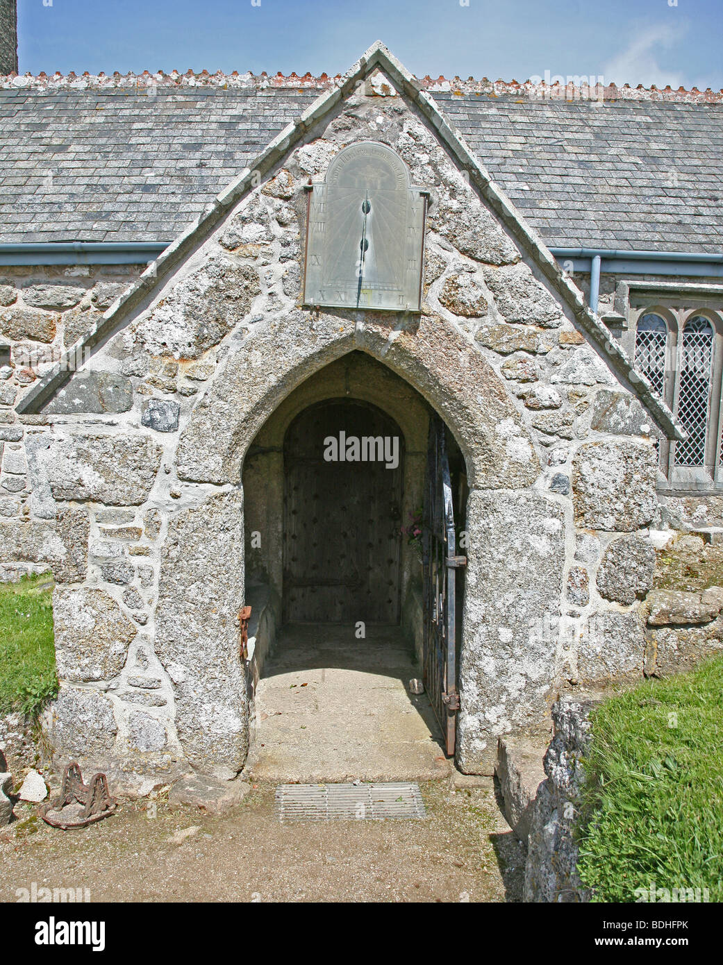 Porch and sun-dial at the church of St. Levan, St. Levan, Cornwall ...
