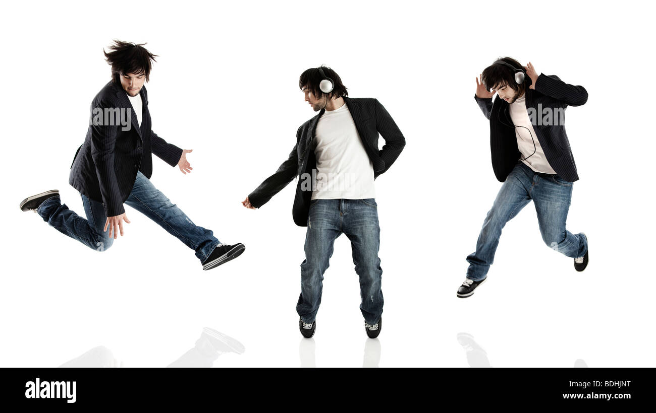 Young modern man dancing over a white background Stock Photo - Alamy