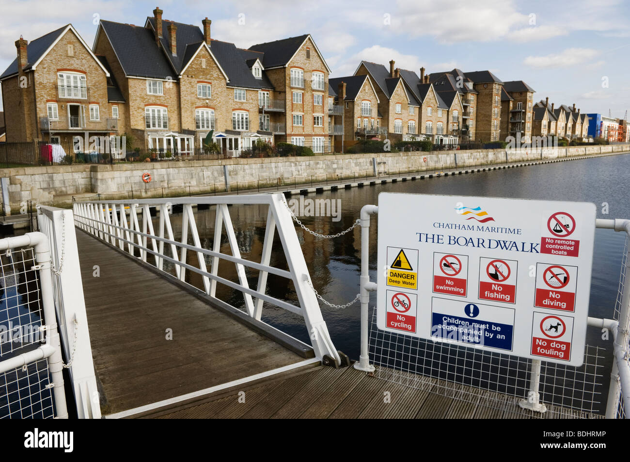Warning sign on entering the boardwalk Stock Photo - Alamy