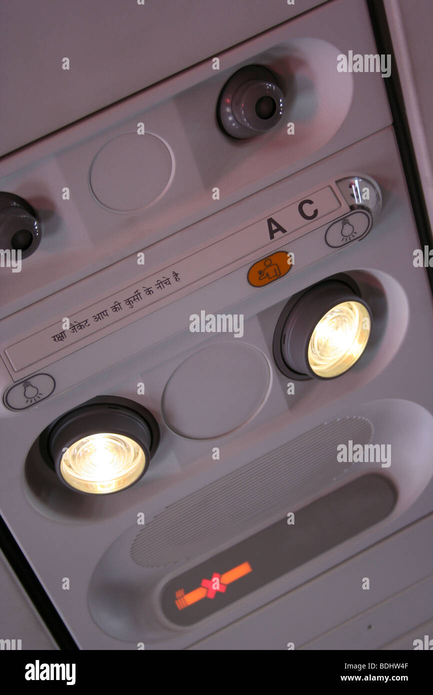 overhead console on board plane switches light Stock Photo - Alamy