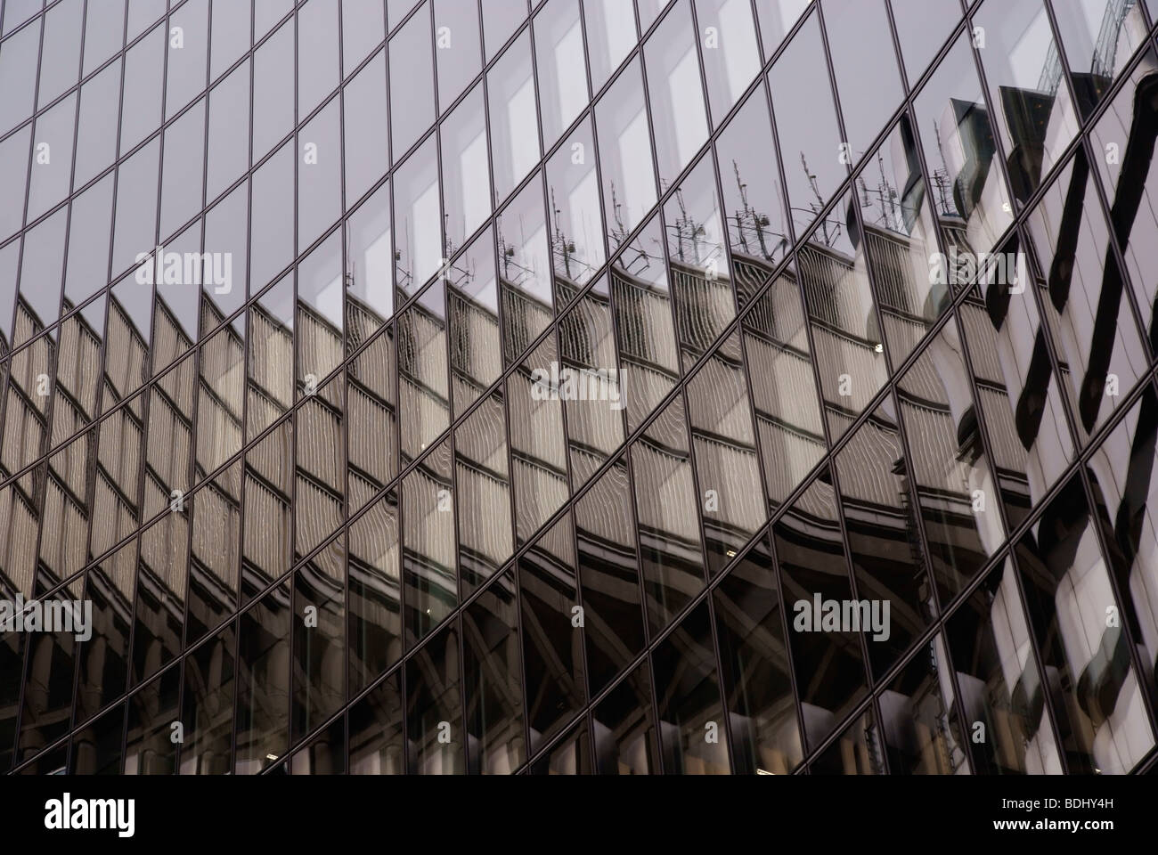 Reflections of the Lloyds Building in the glass cladding of the Willis ...