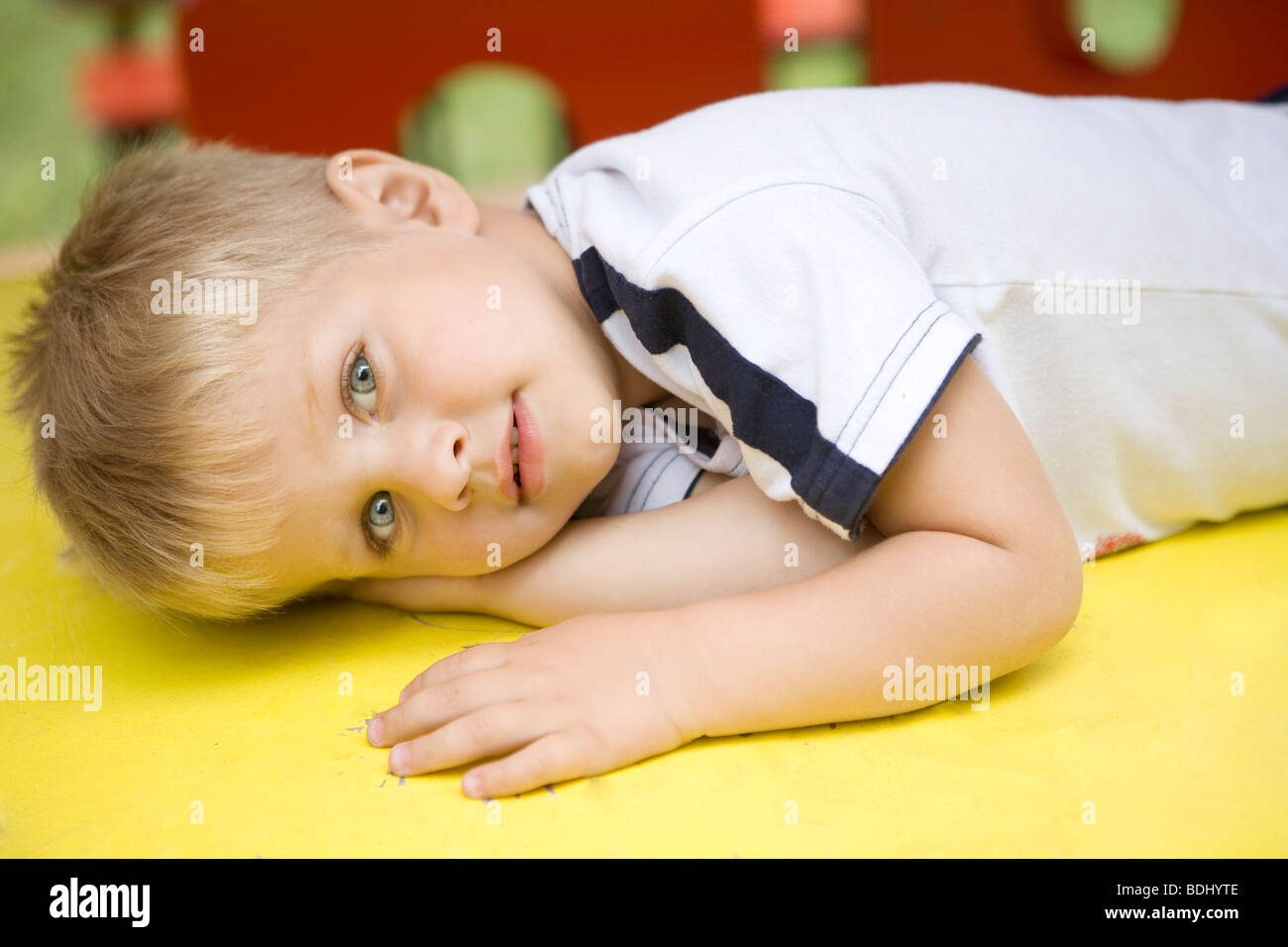 Little cute blond boy four years old lying Stock Photo - Alamy Little cute blond boy four years old lying Stock Photo - Alamy