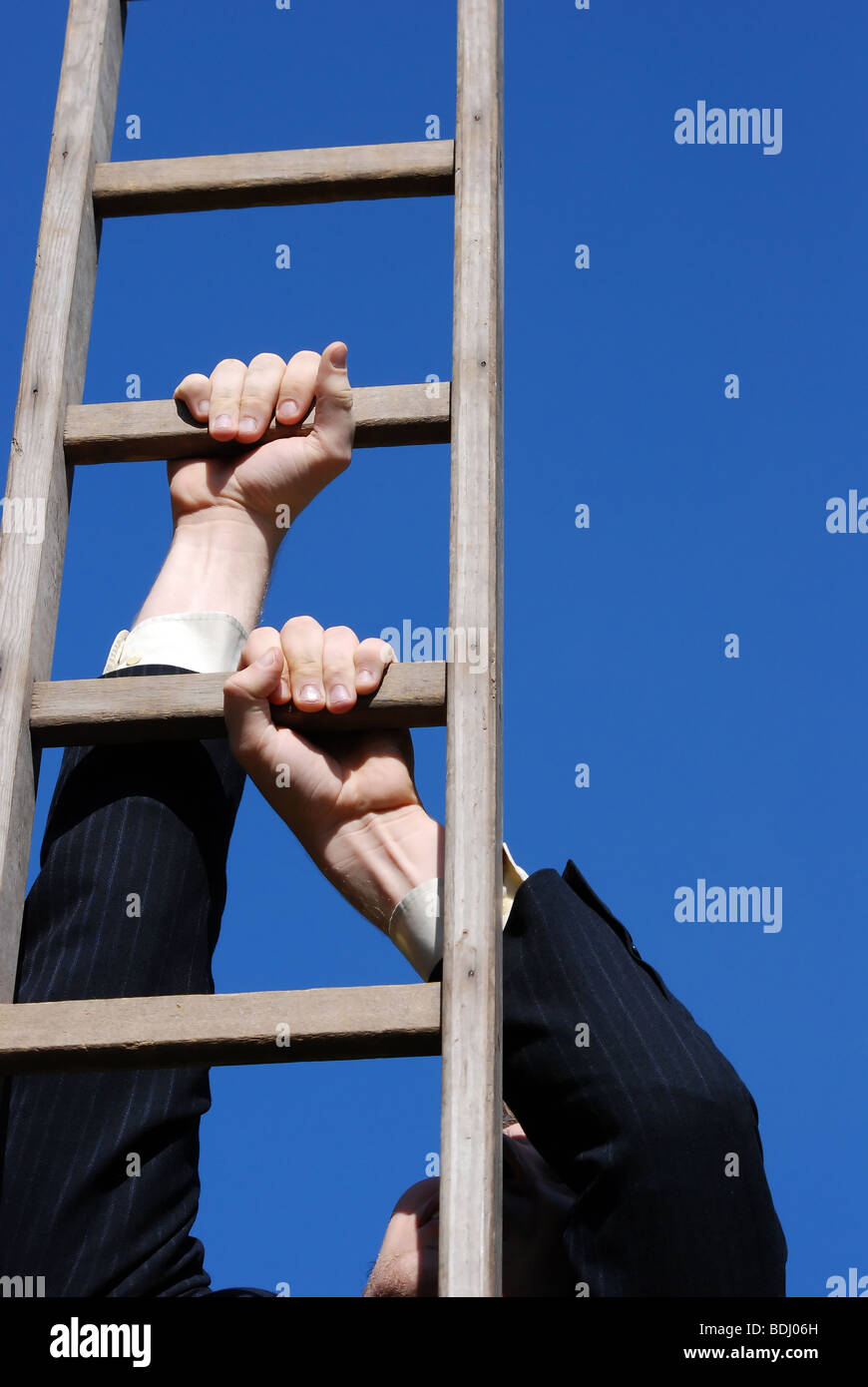 Climbing the ladder of success Stock Photo - Alamy