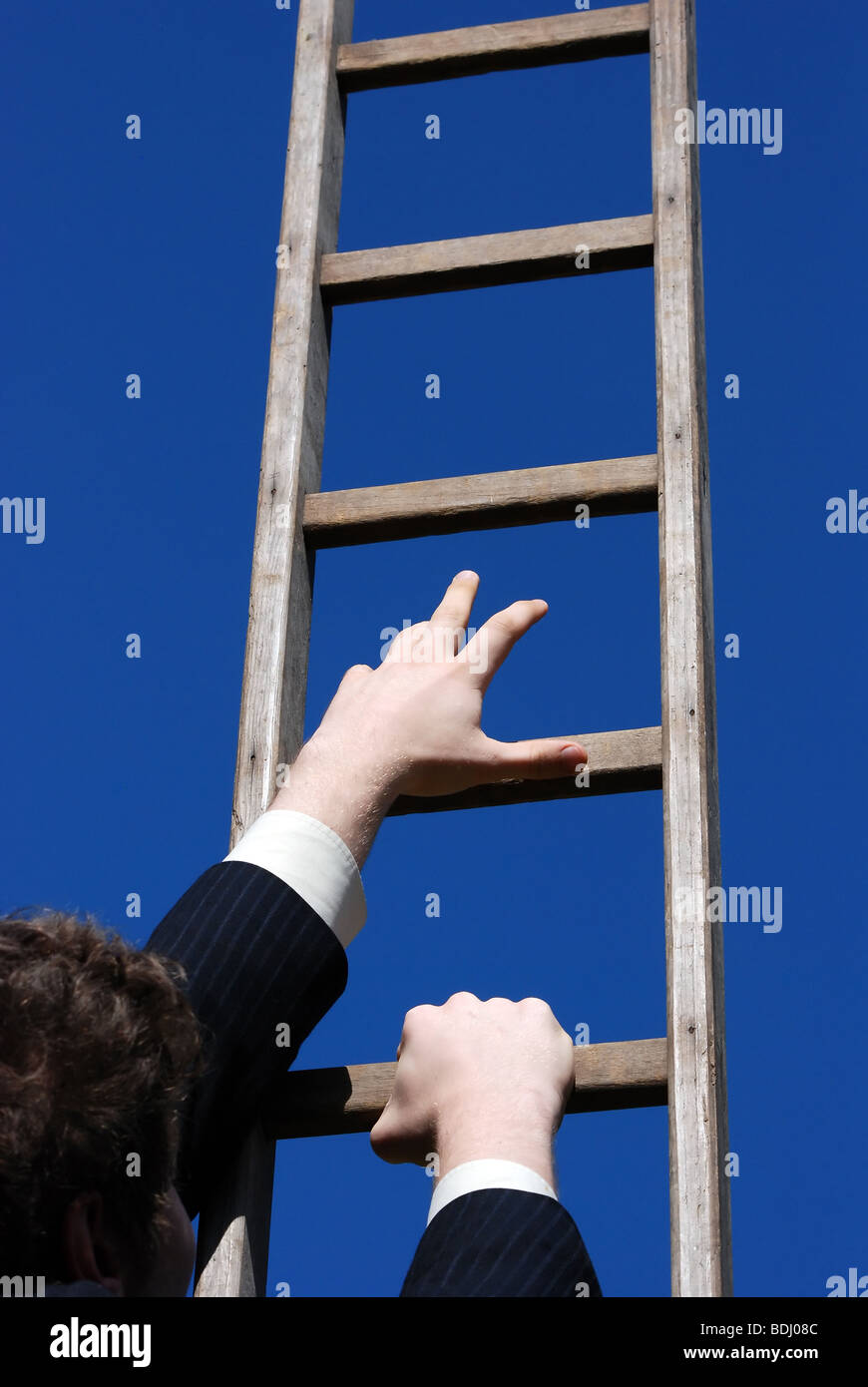 Climbing the ladder of success Stock Photo - Alamy
