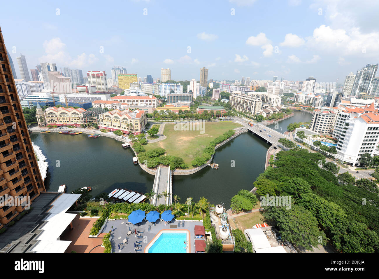 semi-aerial view from 22nd floor of apartment block down to swimming ...