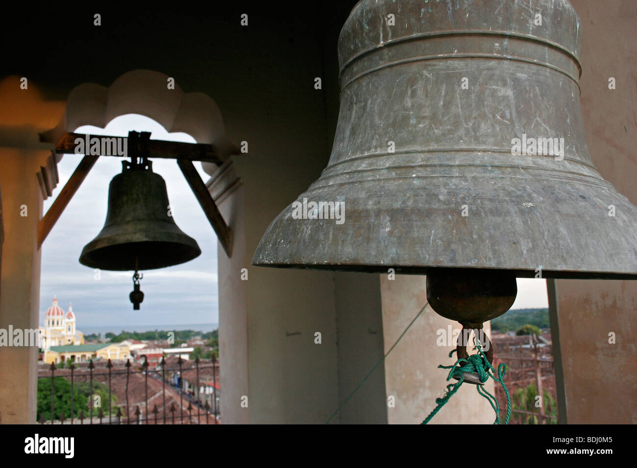 Old bells in church steeple, La Merced Church, in Granada, Nicaragua ...