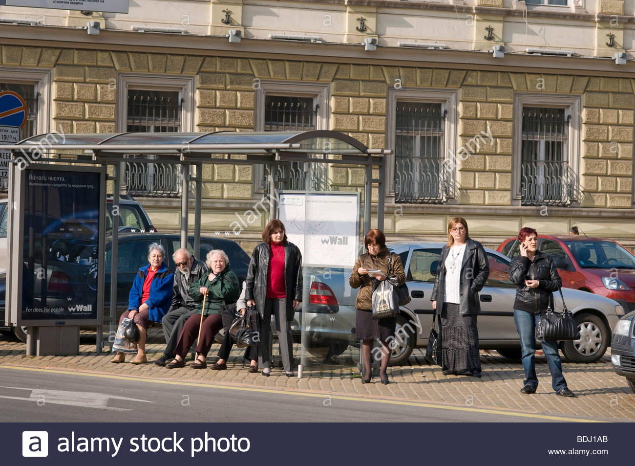 Queue People Waiting Bus Stop Stock Photos & Queue People Waiting Bus ...