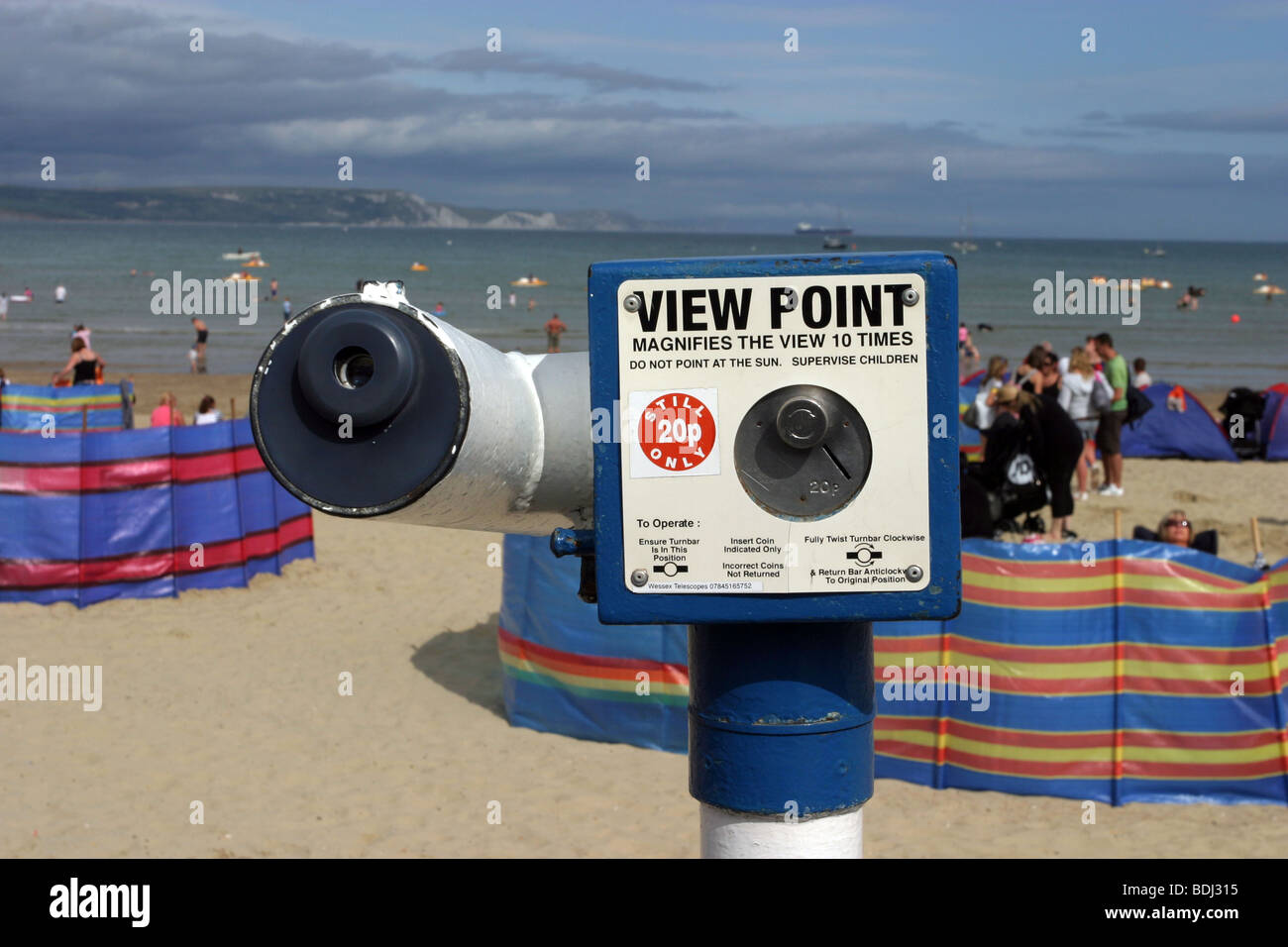 A seaside telescope on Weymouth Beach Stock Photo - Alamy