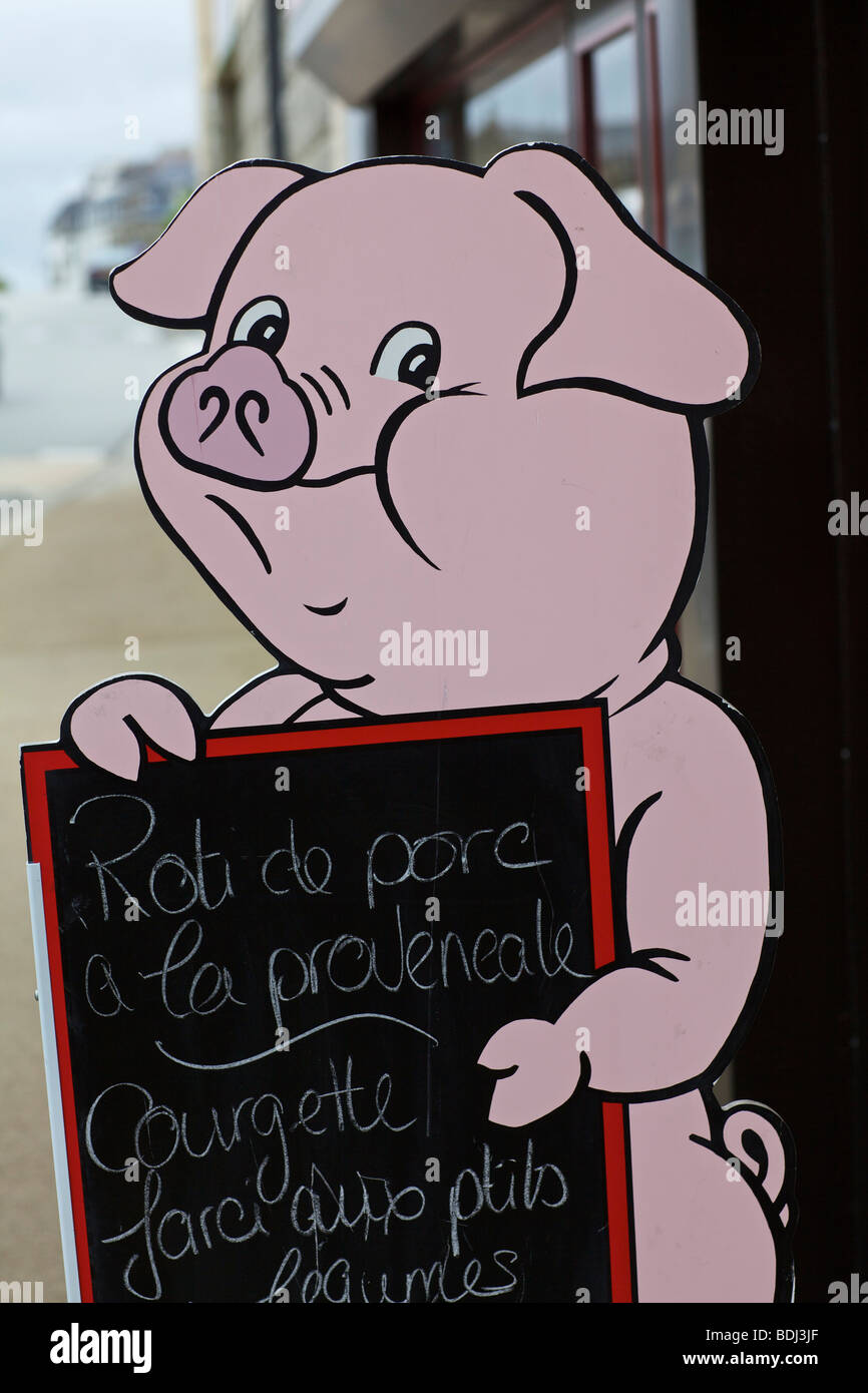 Pig menu sign outside a restaurant in France Stock Photo - Alamy