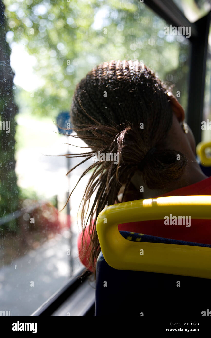 Black woman's head against bus window Stock Photo - Alamy
