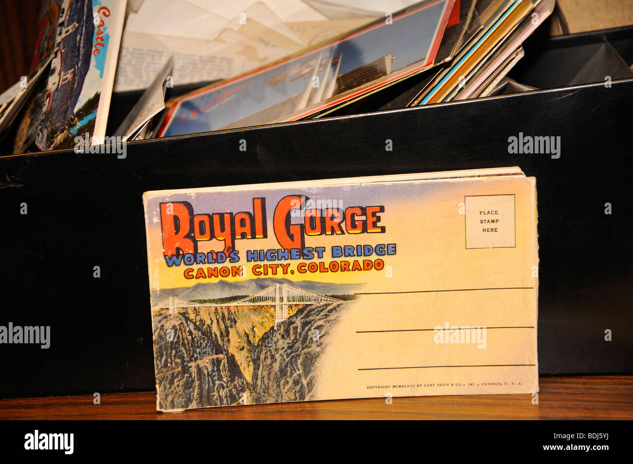 Vintage postcard in antiques shop Stock Photo - Alamy