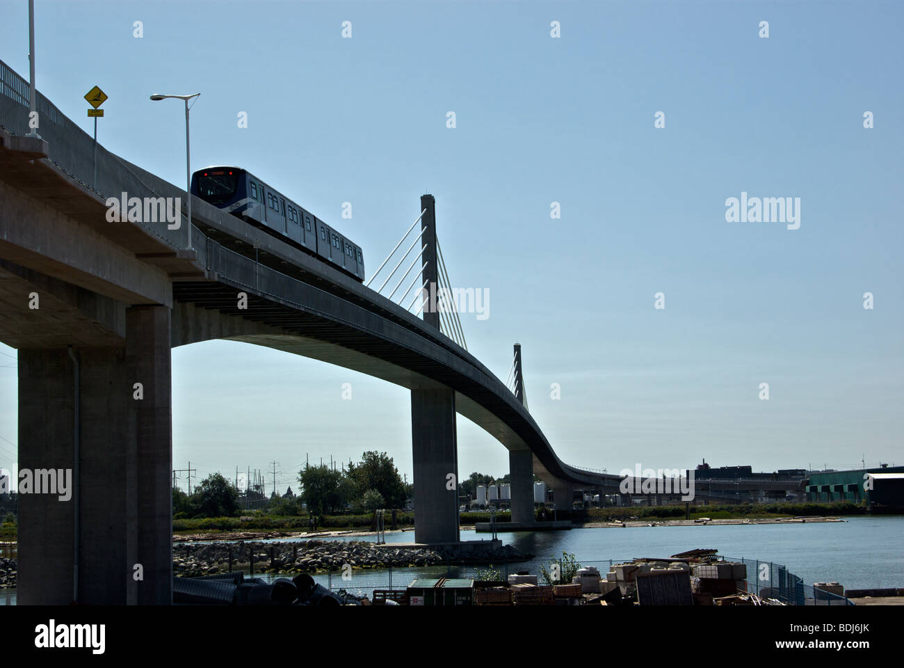 New Canada Line light rapid transit commuter train crossing cable stay ...