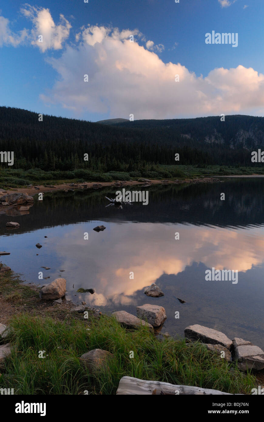 Sunset reflections at a mountain lake in Colorado Rocky Mountains Stock ...