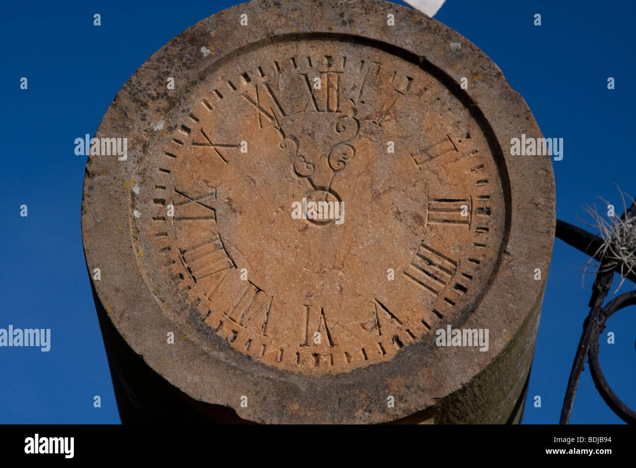 Stone Clock Face against blue sky Stock Photo - Alamy