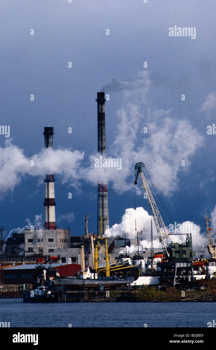 Small shipyard and large factory near Murmansk Stock Photo - Alamy