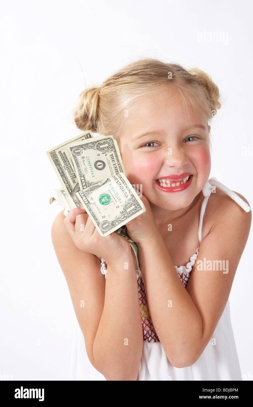 Girl with Money Stock Photo - Alamy