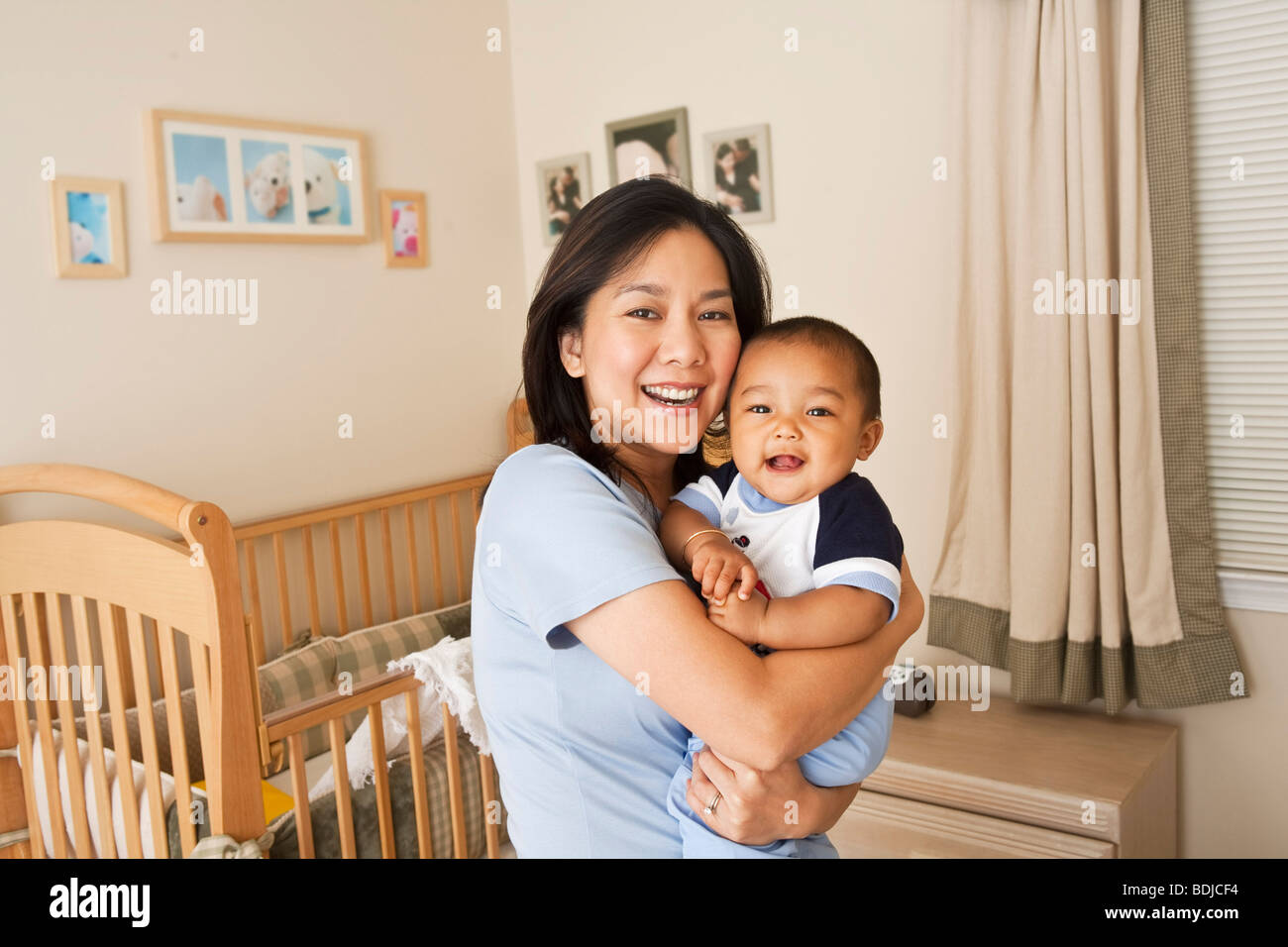 Mother Holding Baby Boy Stock Photo - Alamy Mother Holding Baby Boy Stock Photo - Alamy