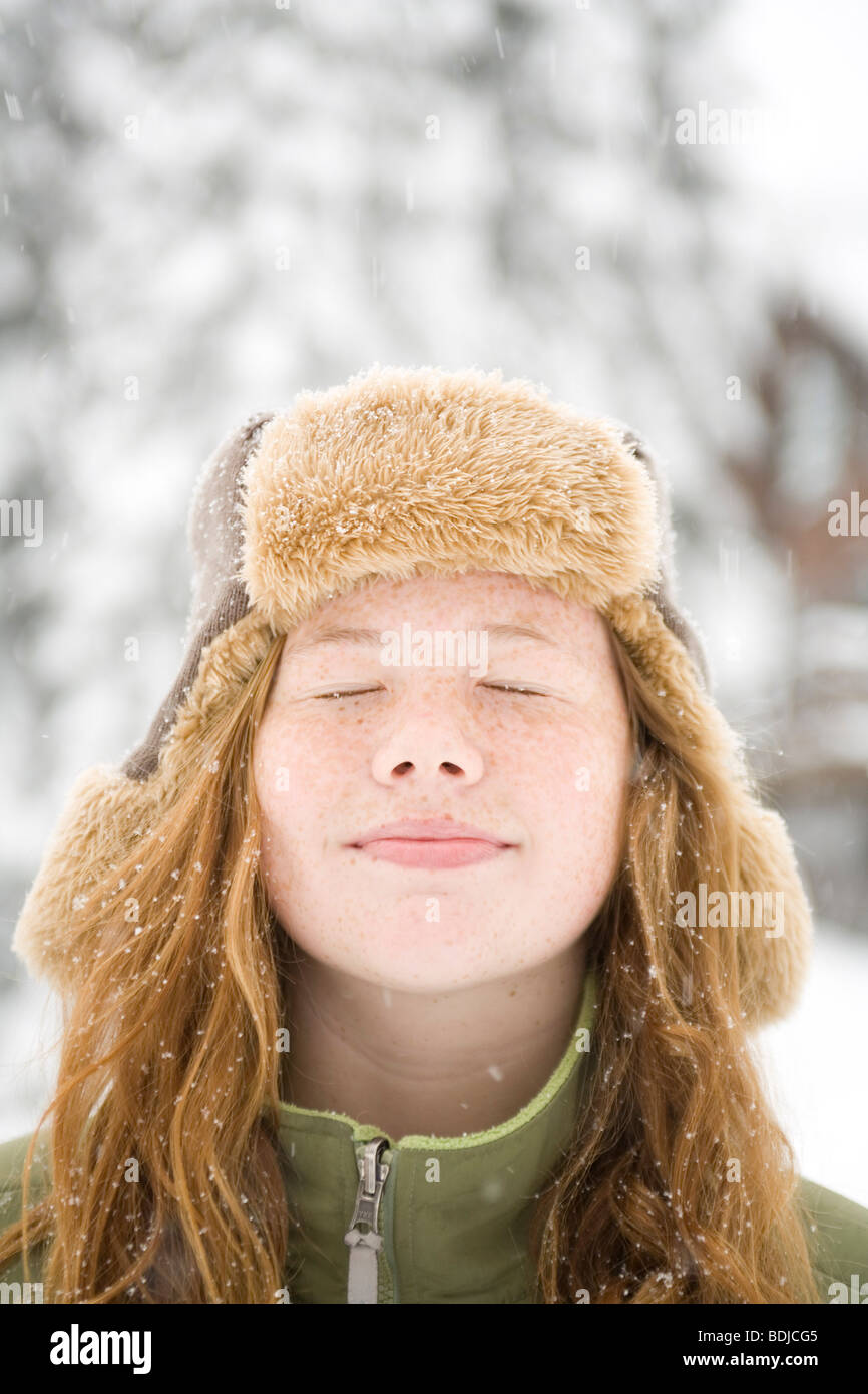 Girl enjoying snowfall hi-res stock photography and images - Alamy