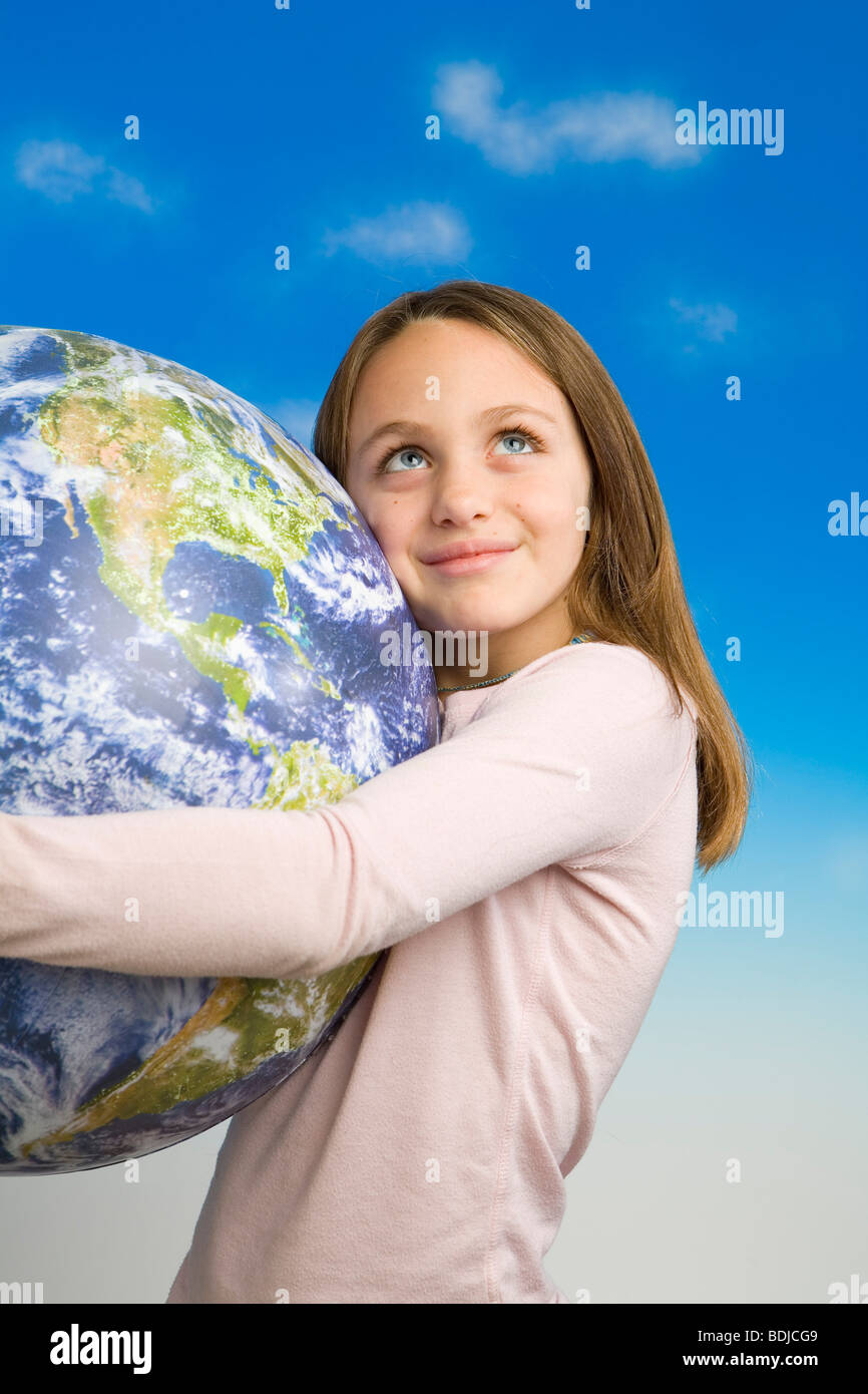 Children hugging the earth hi-res stock photography and images - Alamy