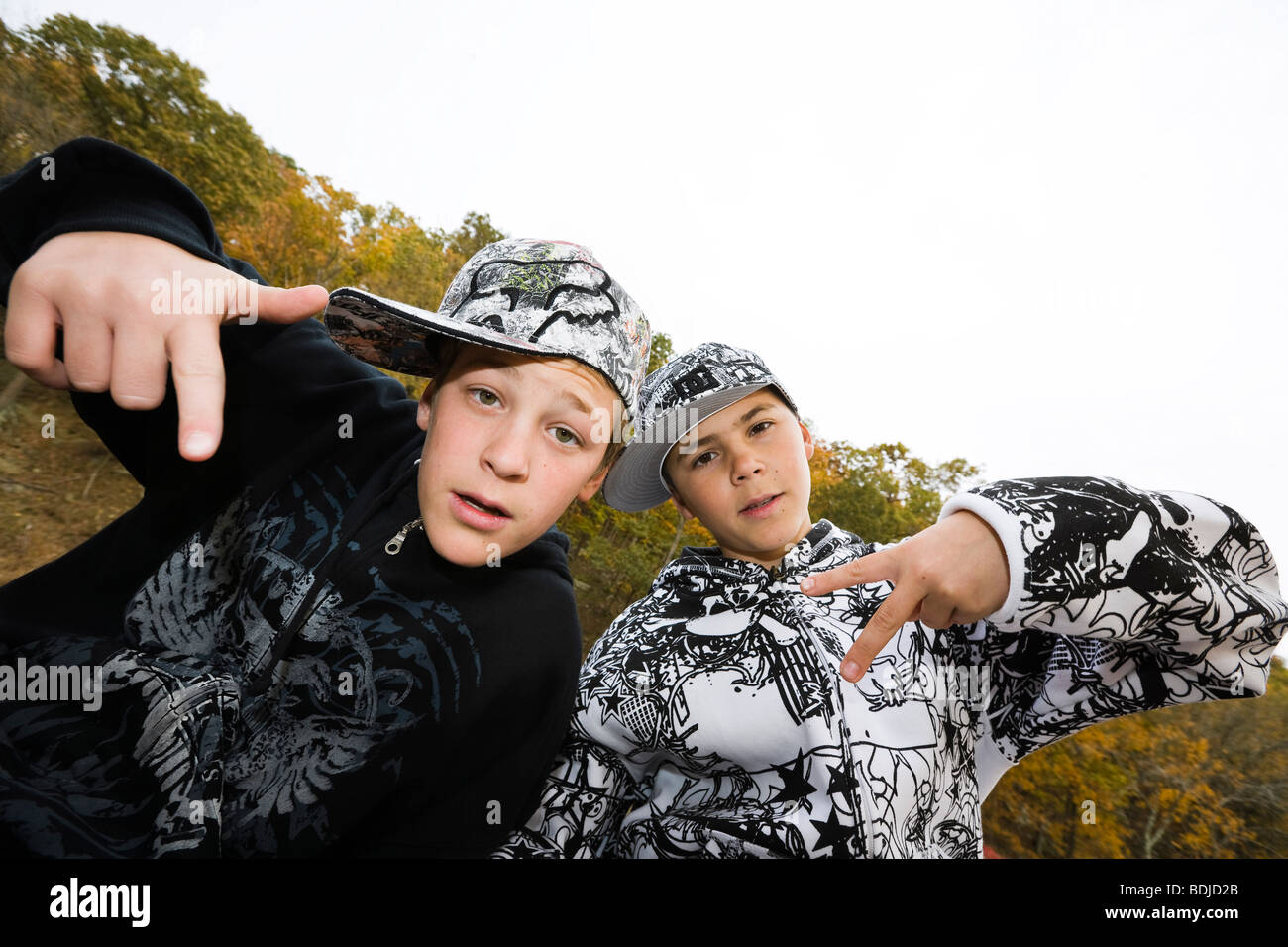 Teenagers Making Hand Gestures Stock Photo - Alamy