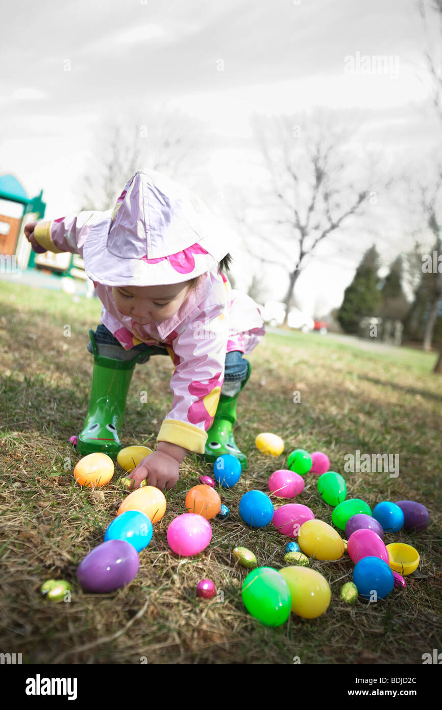 Girl on Easter Egg Hunt Stock Photo - Alamy