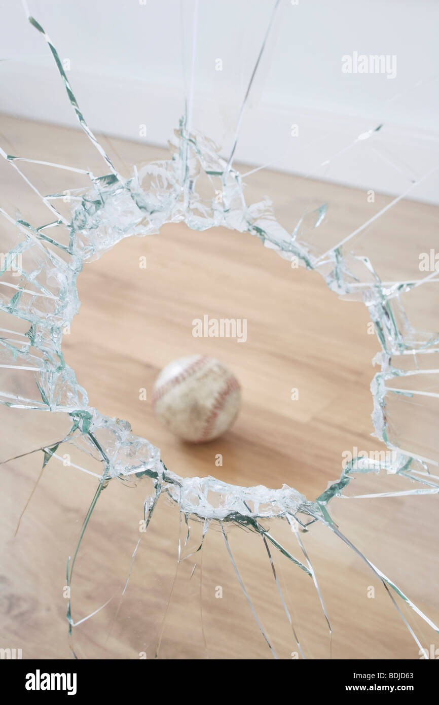 Baseball and Broken Window Stock Photo - Alamy