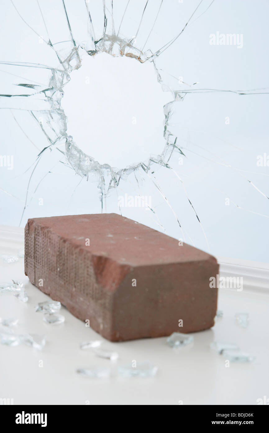Brick and Broken Window Stock Photo - Alamy
