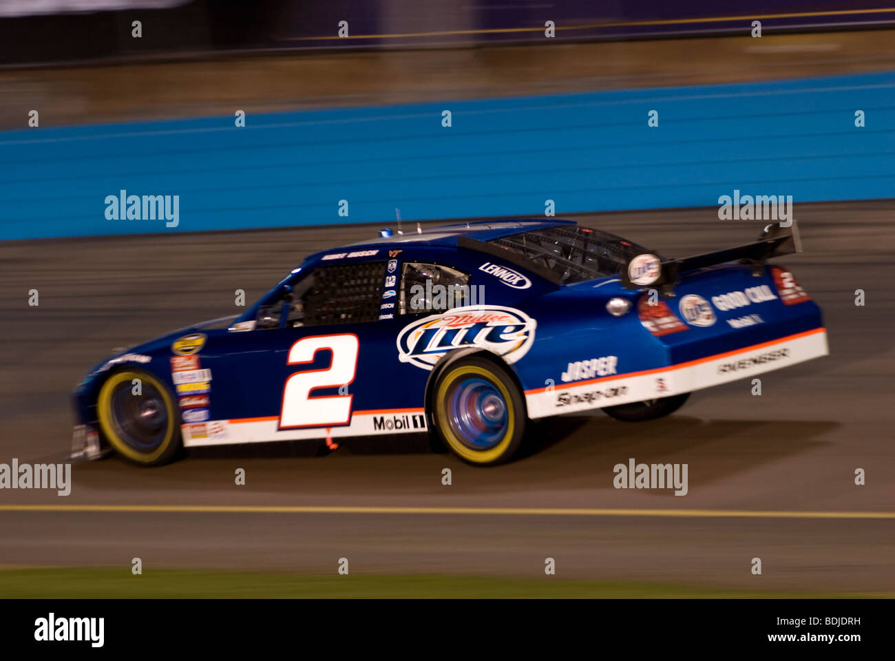 Kurt Busch in nighttime NASCAR action at Phoenix International Raceway ...