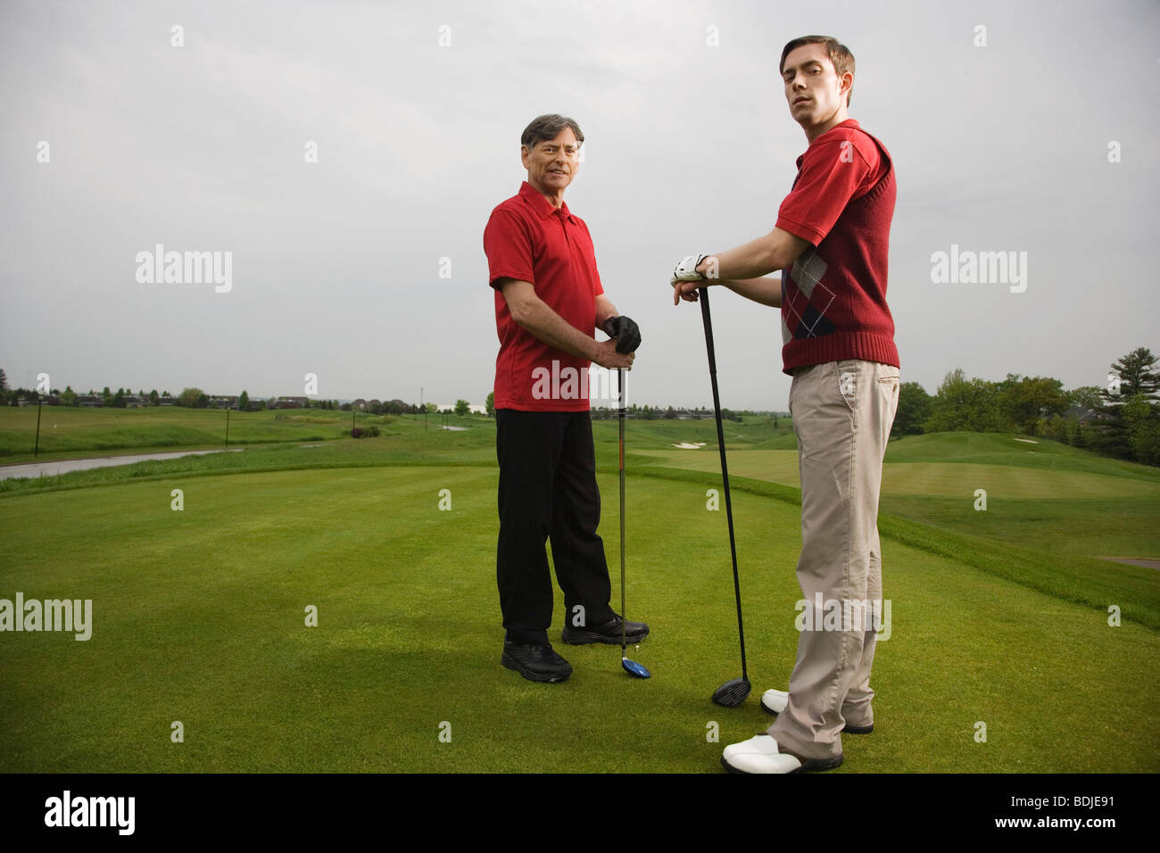 Father and Son Golfing Stock Photo - Alamy
