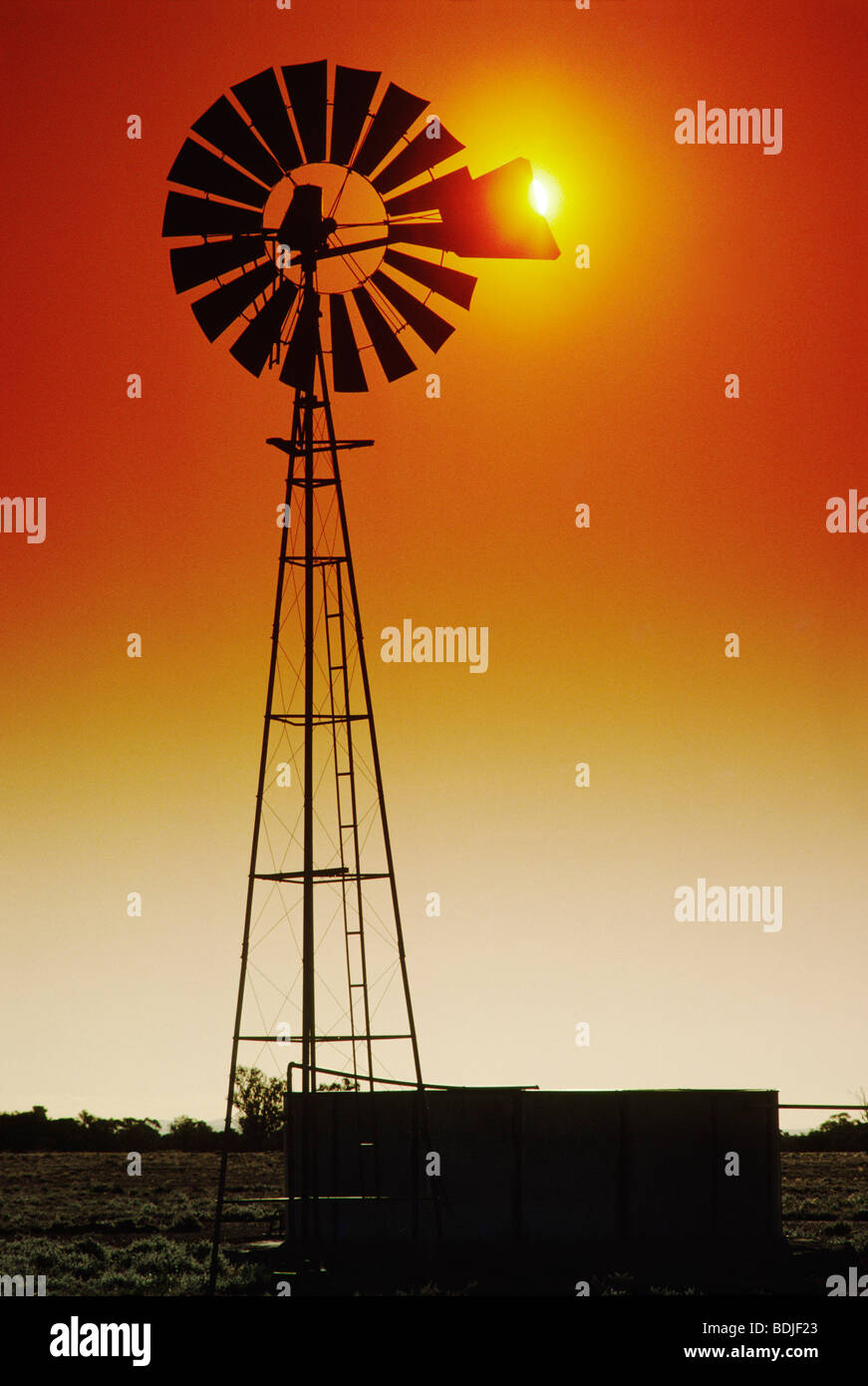 Farm Windmill, Sunset Silhouette Stock Photo - Alamy