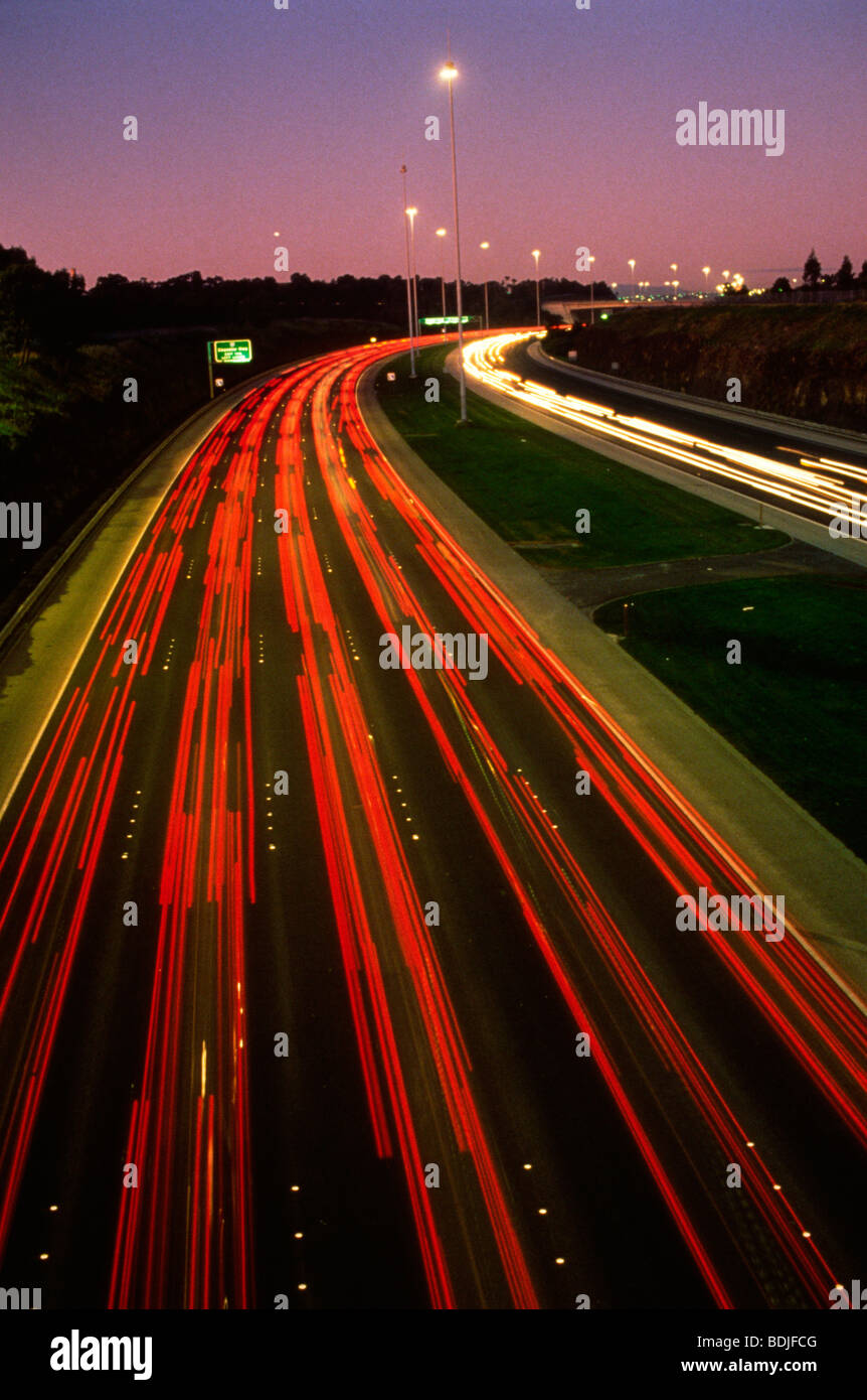 Heavy Traffic on Freeway at Sunset Stock Photo - Alamy