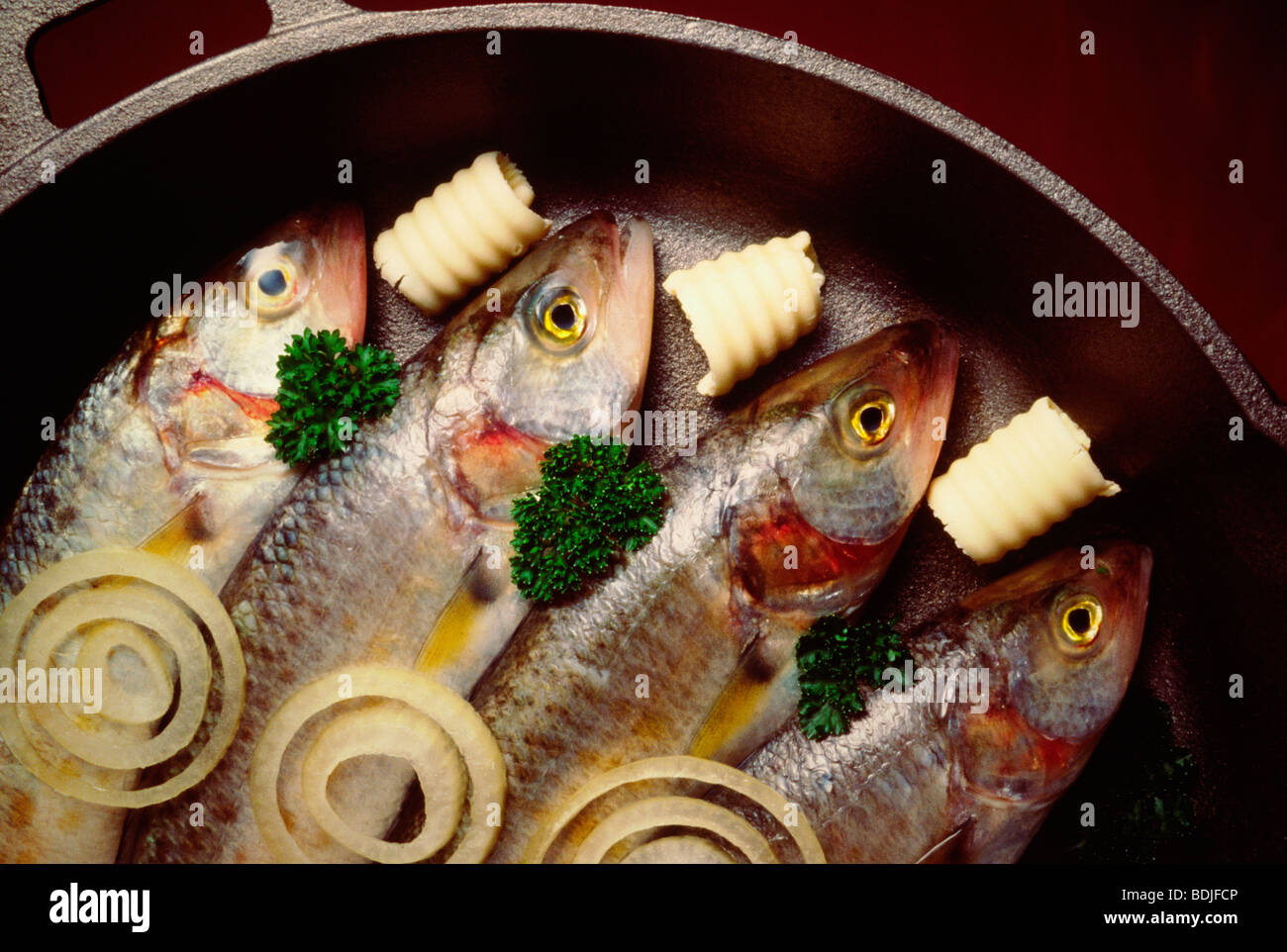 Fish Frying in Pan Stock Photo - Alamy